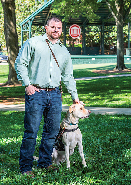 UM alumnus begins career with service dog at side | The Oxford Eagle