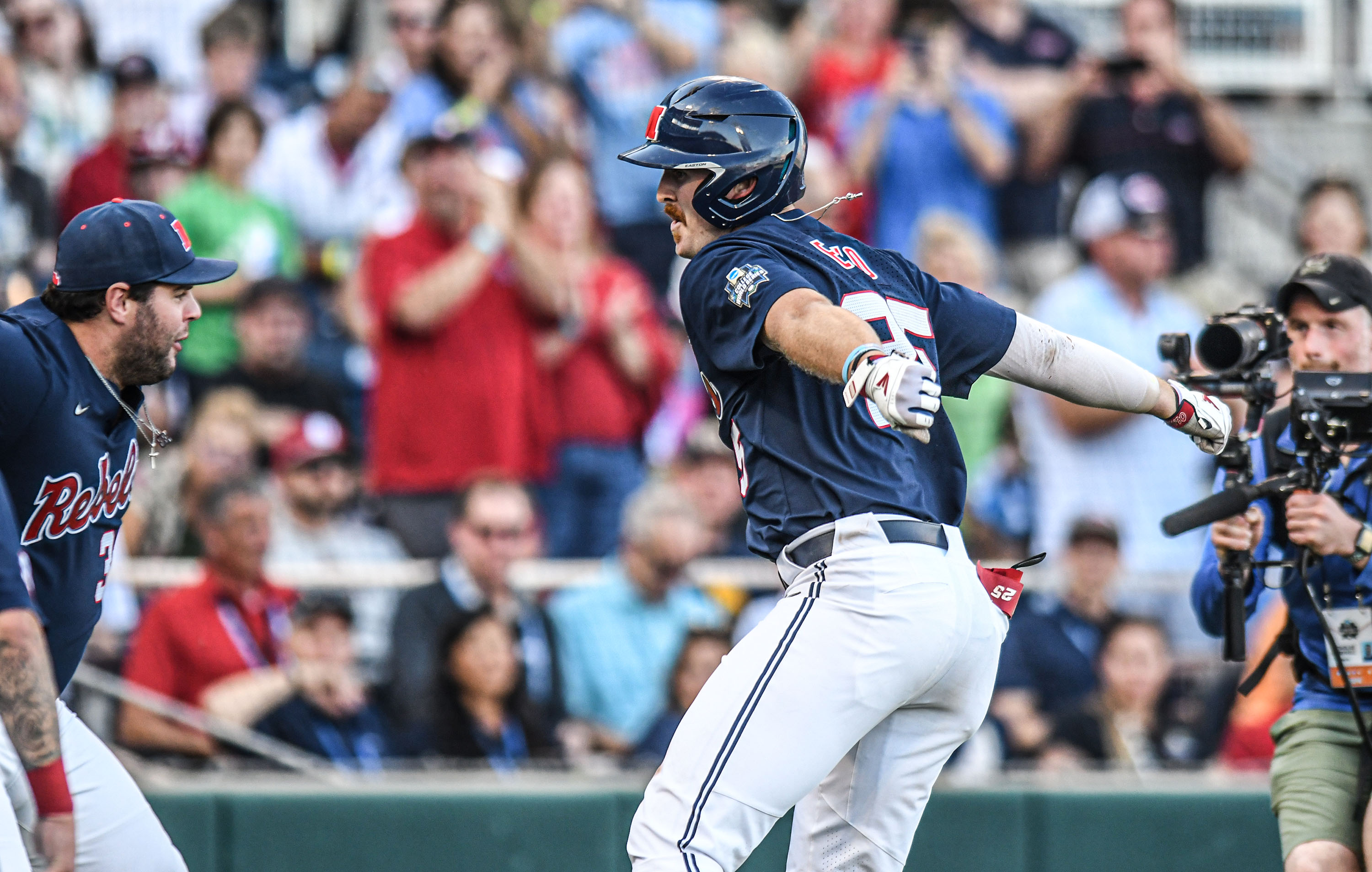 Gallery: Ole Miss defeats Oklahoma in game one of College World Series ...